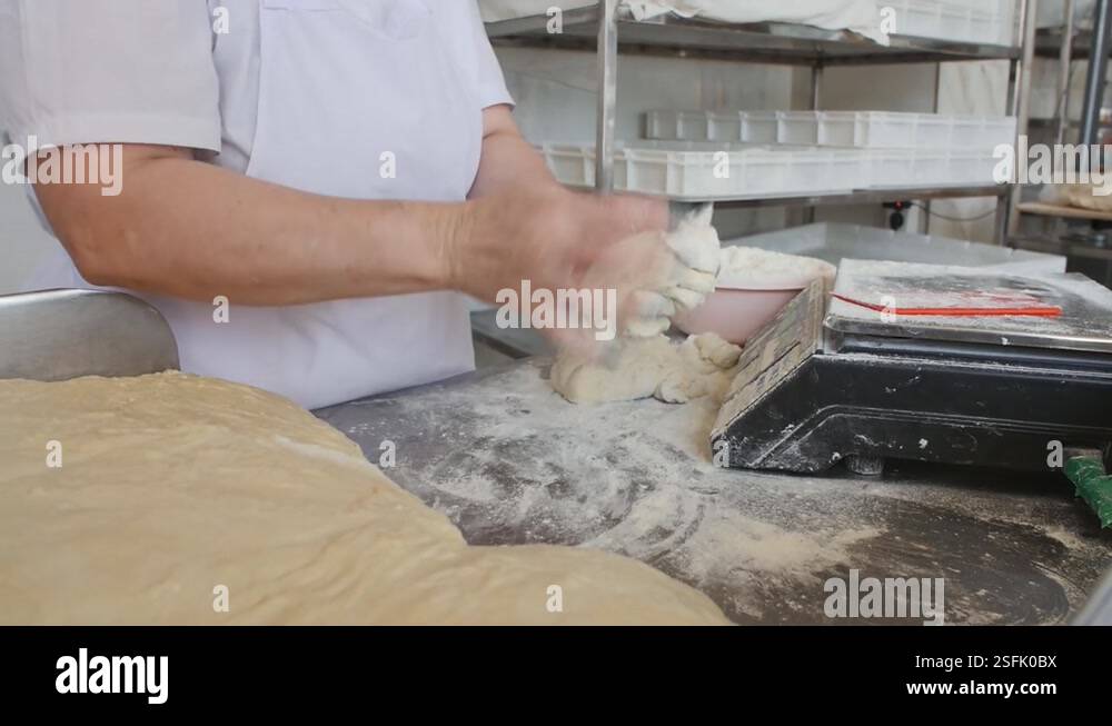 Woman baker in white Stock Videos & Footage - HD and 4K Video Clips - Alamy