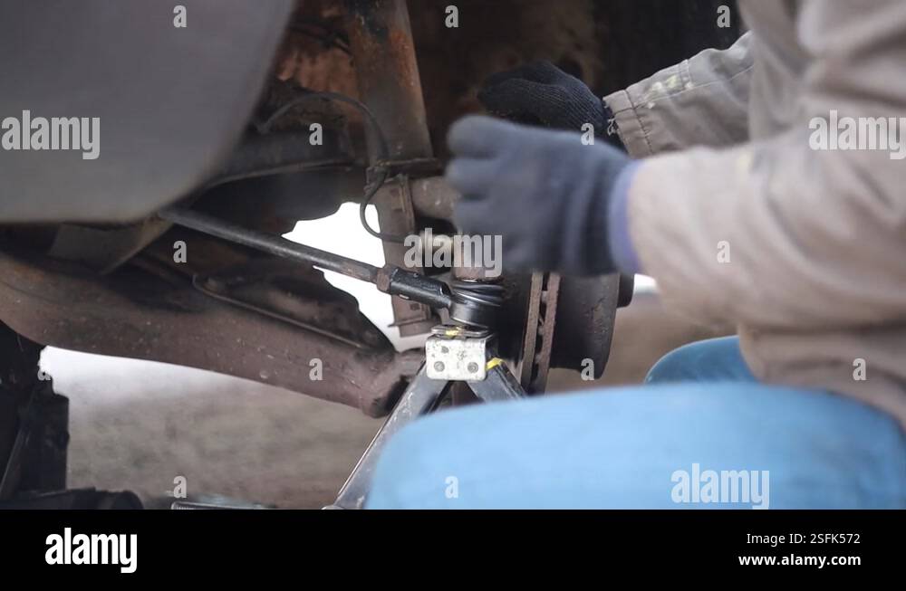 car steering repair, installation of steering tips and rods Stock Video ...