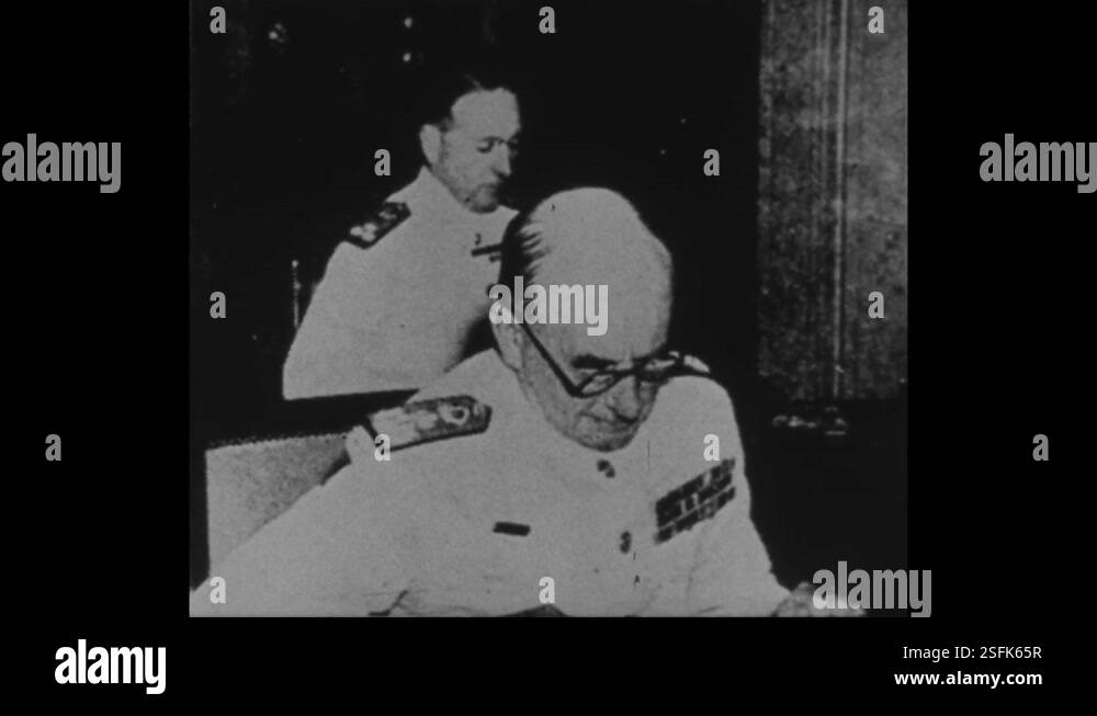 1940s: World leaders meeting. American soldiers marching. Tanks in mud ...