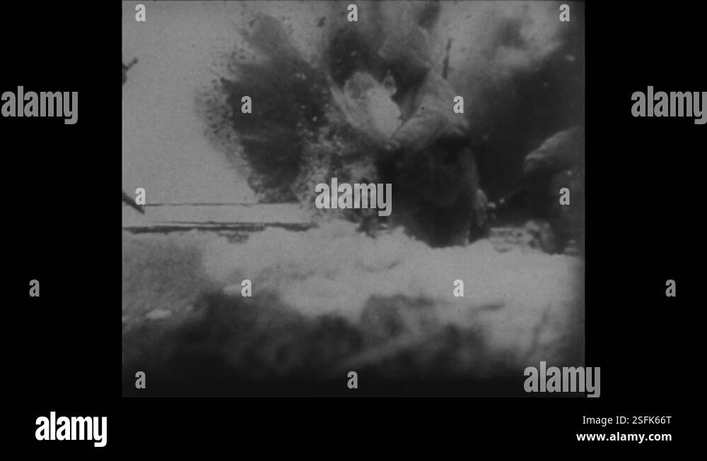 1940s: Soldiers marching on snowy ground. Bombs fall from sky and ...