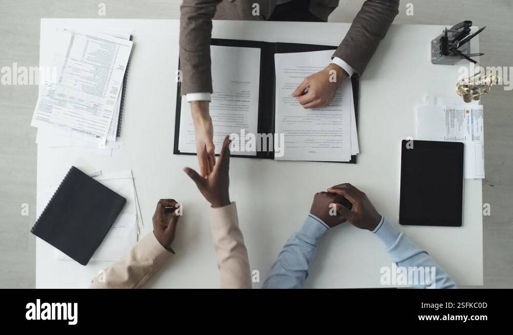 Business Handshake Top View Stock Video Footage - Alamy