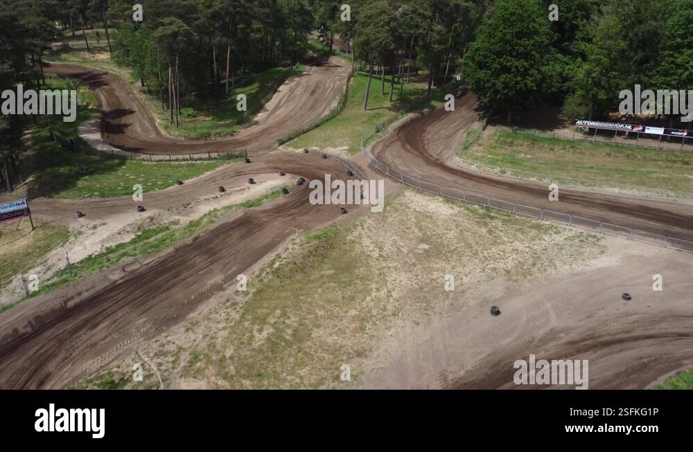 Motorcycles on motocross terrain in the forest in Halle, The ...