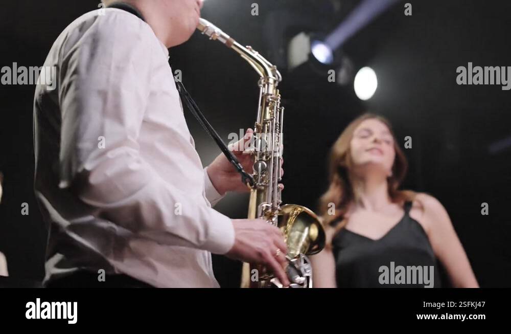 Musical group band dancing, singing performing on concert musician ...