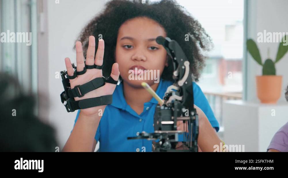 African black teenager students learning about robotic arm school Stock ...