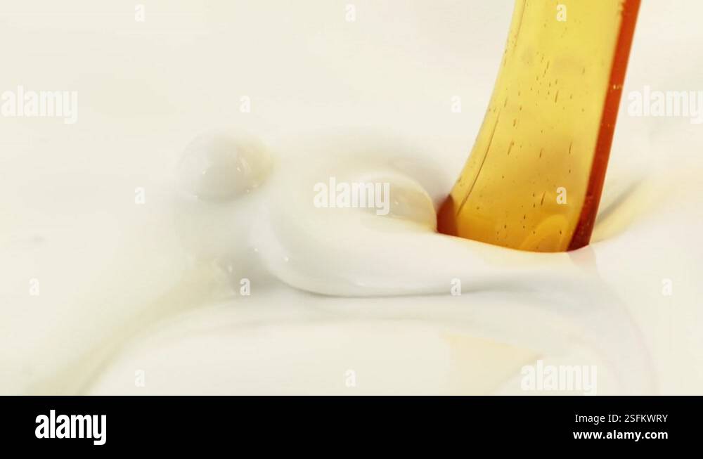 Super slow motion of mixing cream with oil in detail Stock Video ...