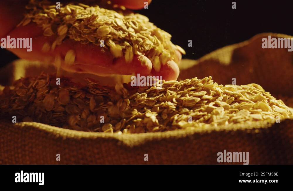 Grocery, cornflakes on black background close-up. Harvest season and ...