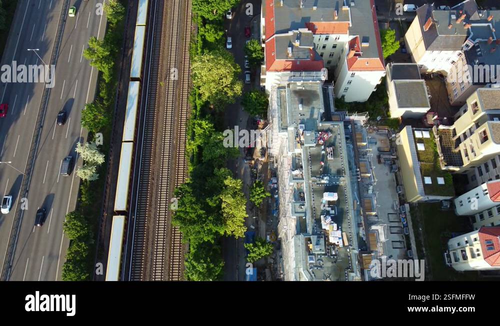 cars on Autobahn, S-Bahn Train, street. Unbelievable aerial view flight ...
