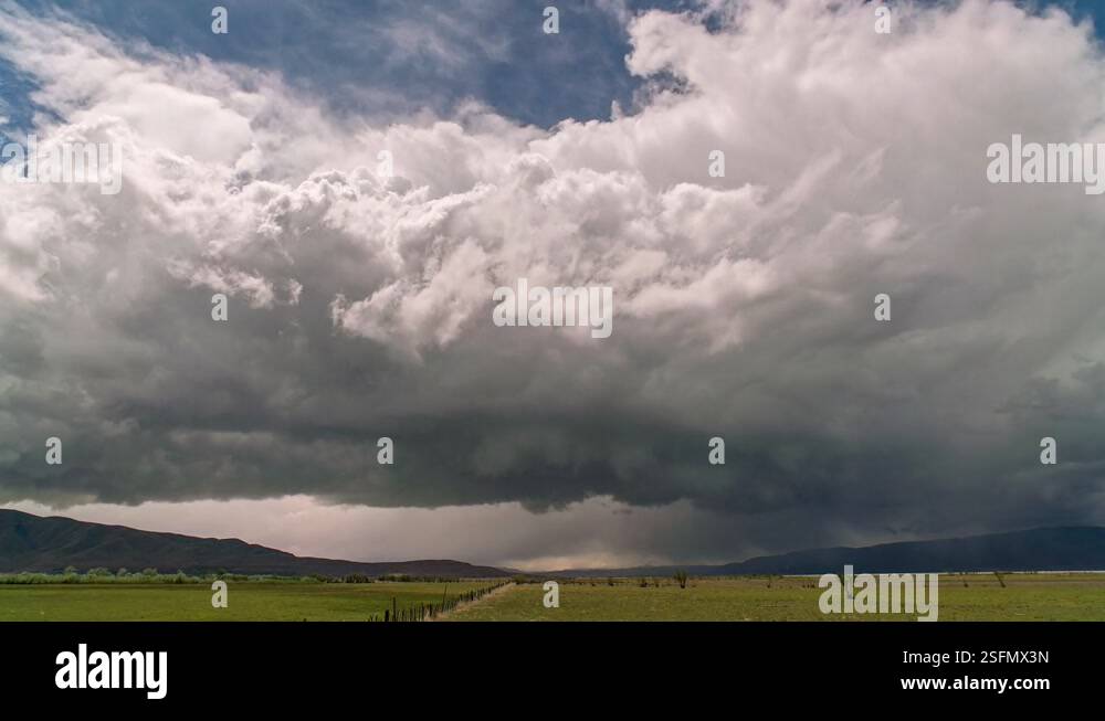 Thunderstorm rolling over the landscape towards and overhead Stock ...