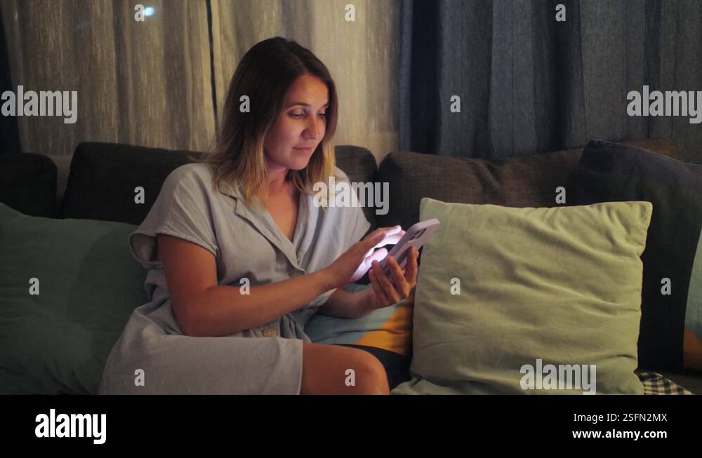 Woman enjoy fun chat typing on app, relax watch viral live video play ...