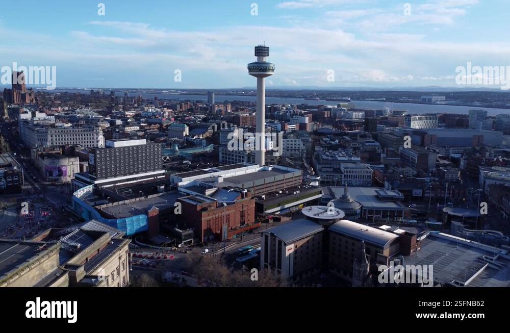 Establishing rising aerial view of Liverpool city centre in the UK ...