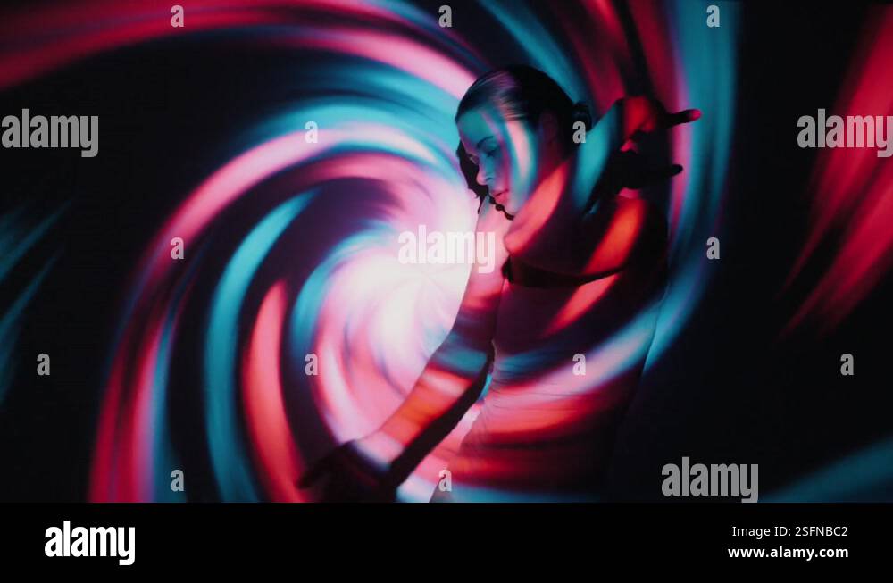 Female in bodysuit dancing sensual dance overlay twirl neon colorful ...