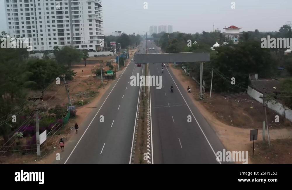 Beautiful aerial view of a highway with traffic and nature in daylight ...