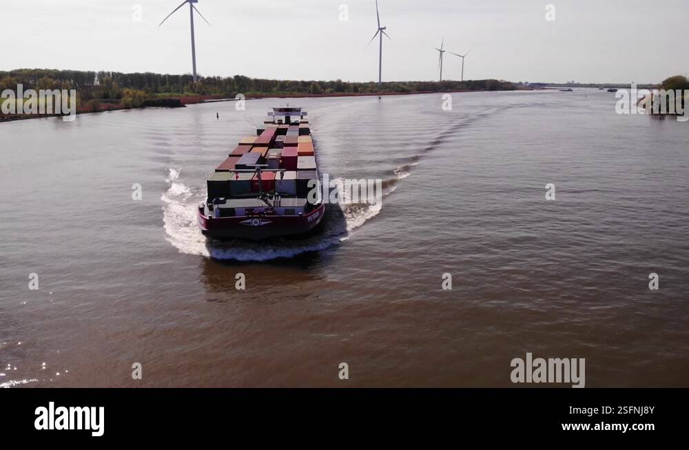 Aerial From Forward Bow Of Petran Cargo Ship Navigating Along Oude Maas ...