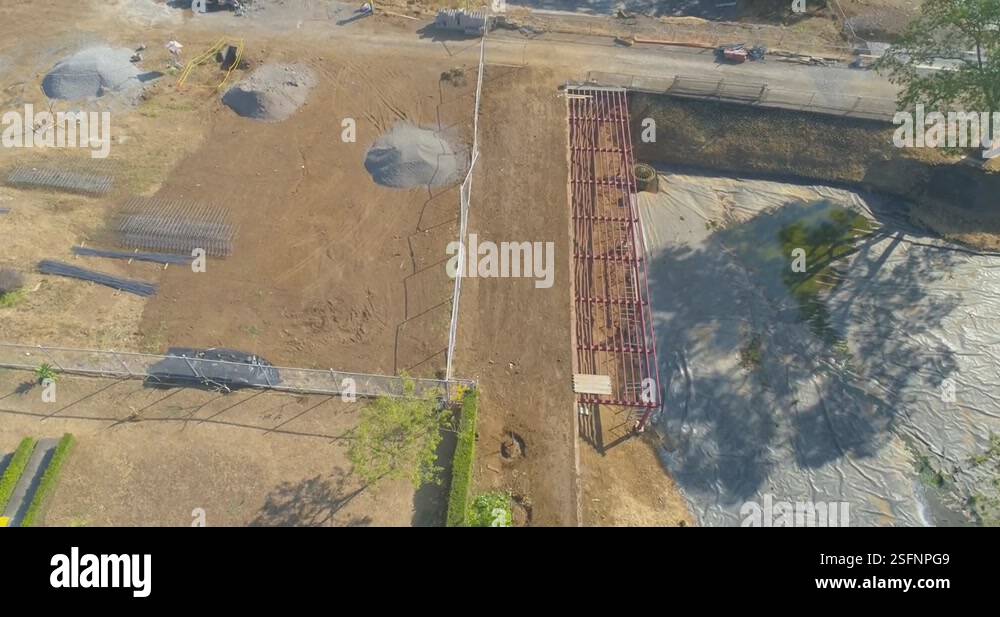 drone shot, cement slab construction, cement mixer truck, cement ramp ...