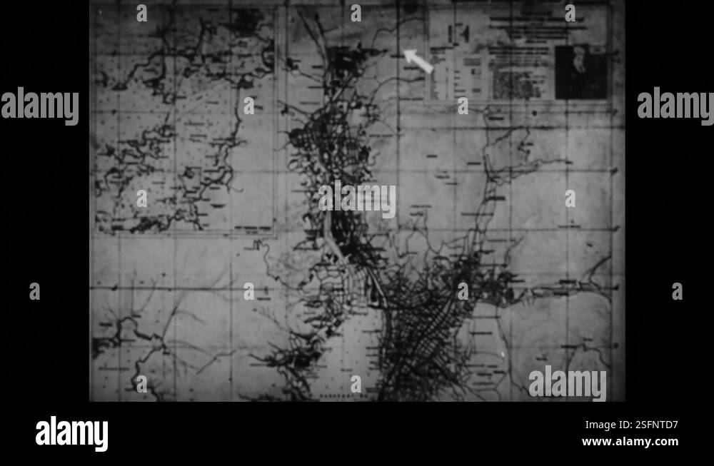 Japan 1940s: Map of Nagasaki. Arrows point to the north and south, and ...