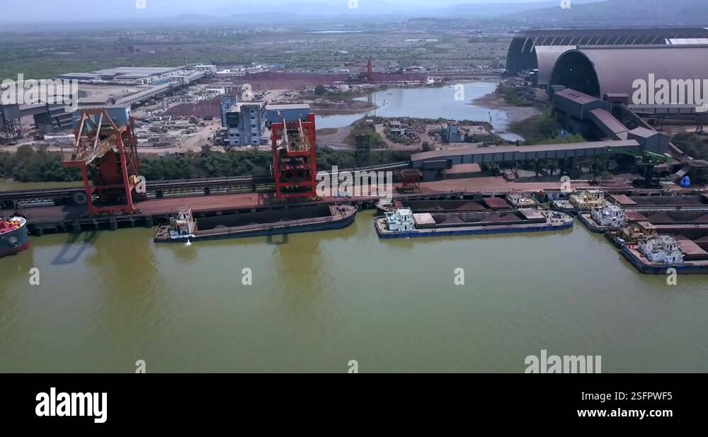 Loaded Freight Barges And STS Cranes In The Terminal Of Dolvi Port ...