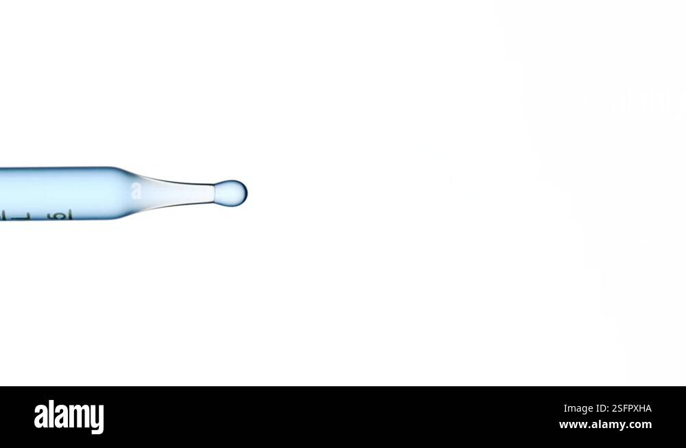 Blue fluid is dripped from graduated lab pipette Stock Video Footage ...