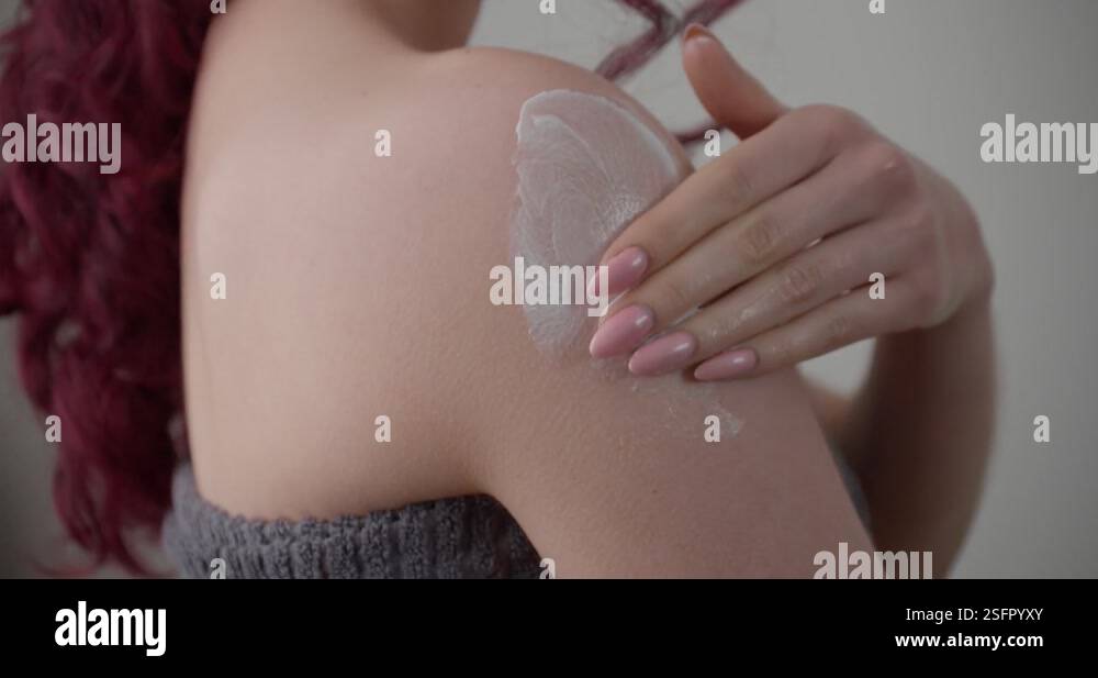Woman creme shoulder Stock Videos & Footage - HD and 4K Video Clips - Alamy