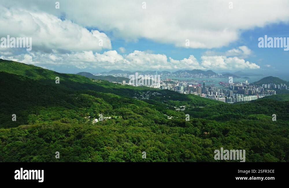 A dynamic high altitude aerial footage revealing the cityscape of Hong ...