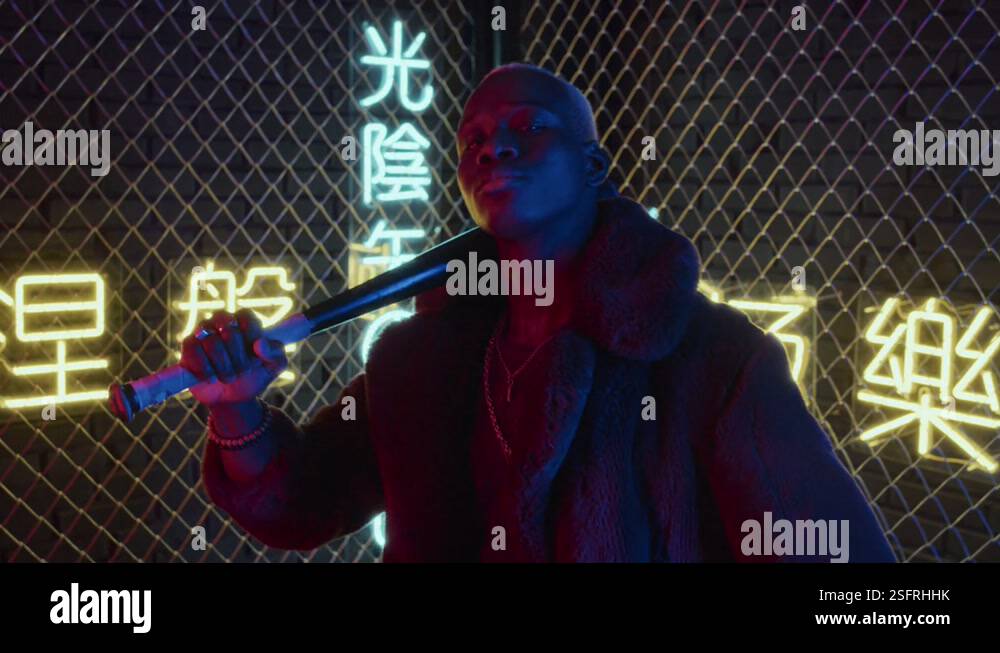 Cyberpunk Guy with Bat Stock Video Footage - Alamy