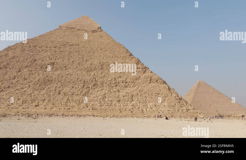 Historical Location at Giza pyramid complex, panning shot of Pyramid of ...