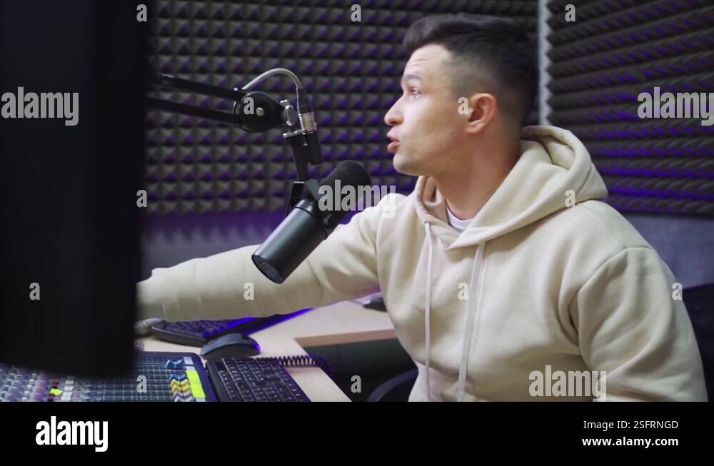 a male radio host on the air in the radio studio. professional dj Stock ...