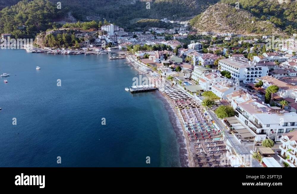 Drone view of seaside pier and beach in resort village Turunc in Turkey ...