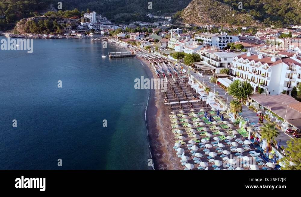 Drone view of seaside pier and beach in resort village Turunc in Turkey ...