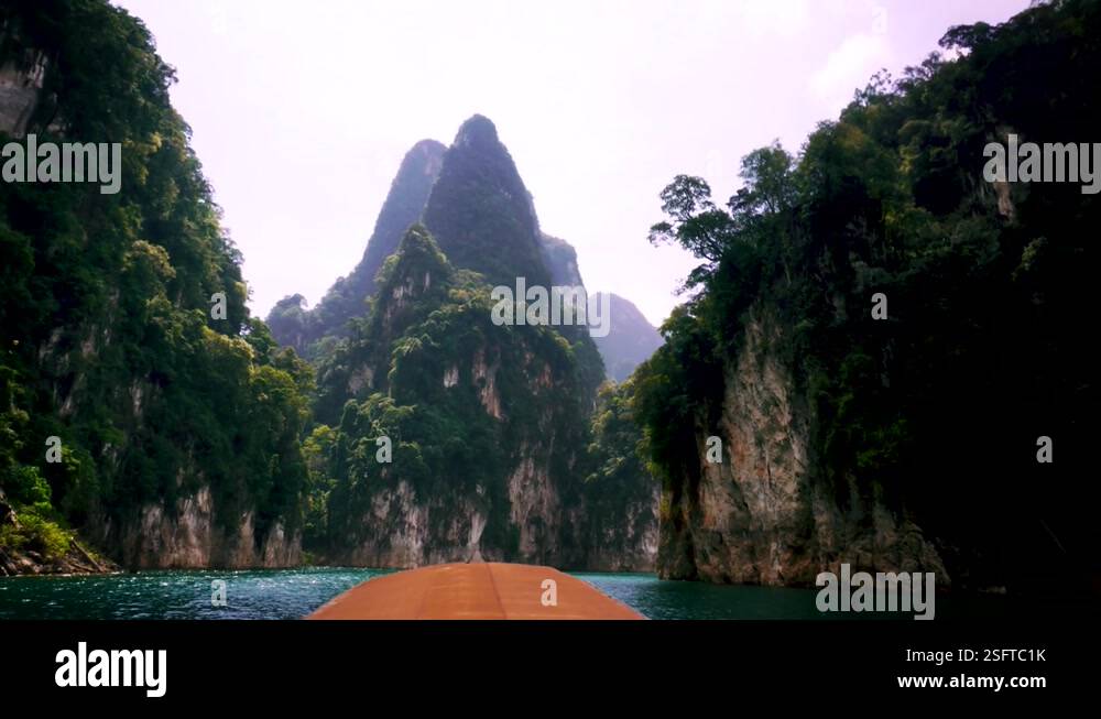 POV Of Epic Famous Limestone Cliffs At Cheow Lan Lake Stock Video ...