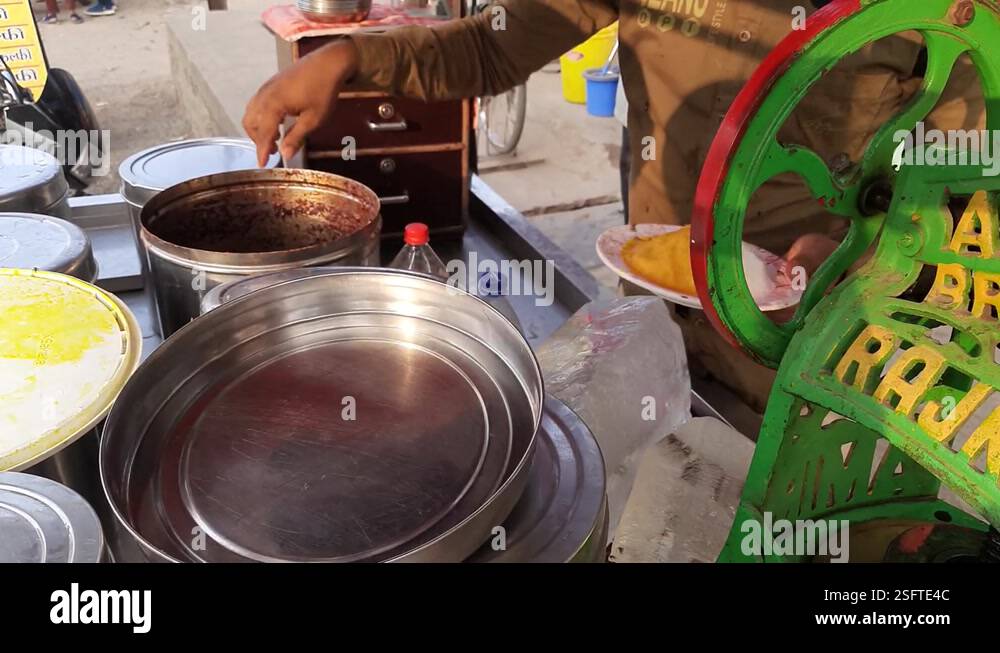 Chuski preparation - A man makes Indian famous popsicle or Kala Khatta ...
