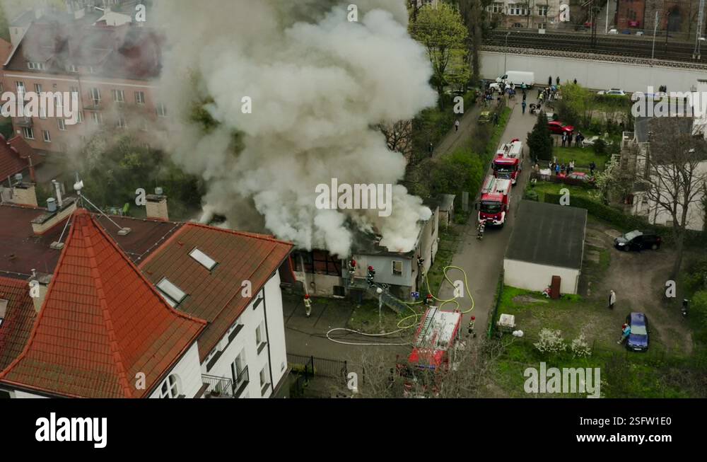 Old city and a fire in residential building. Big fire in a residential ...