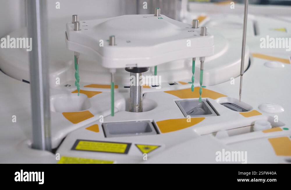 Modern clinical biochemistry analyzer machine conducts multiple blood ...