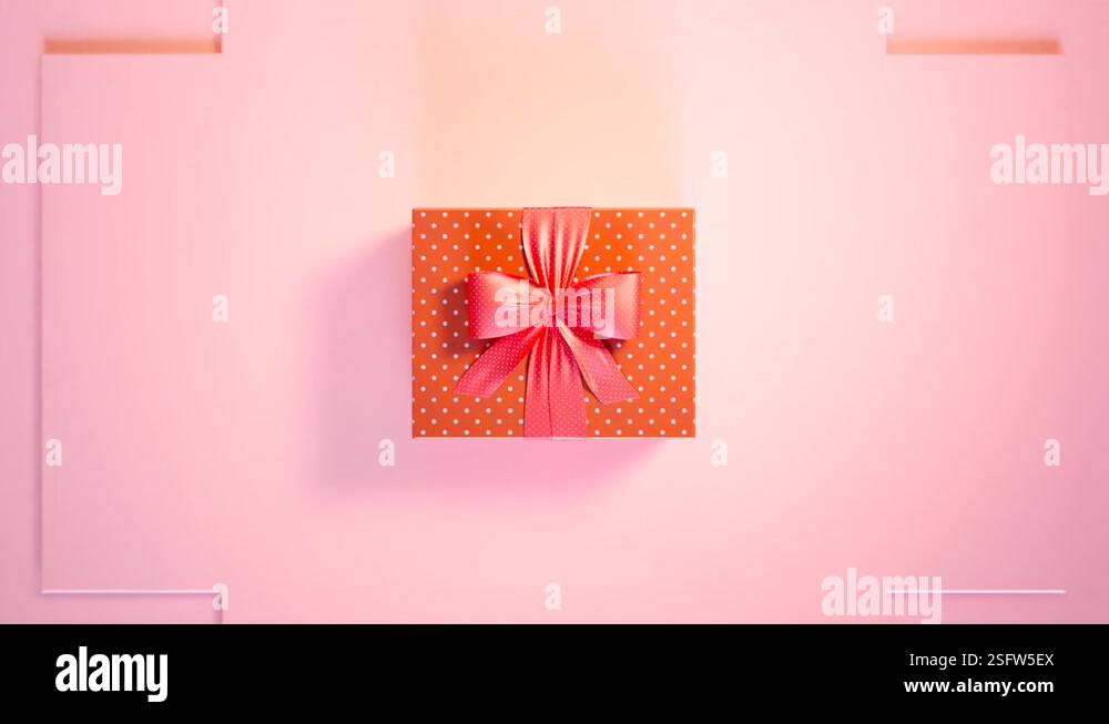 Unpacking a present box with a red ribbon. Receive Christmas or ...