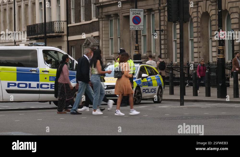Police officers at roadblock on Parliament Street. London, England ...