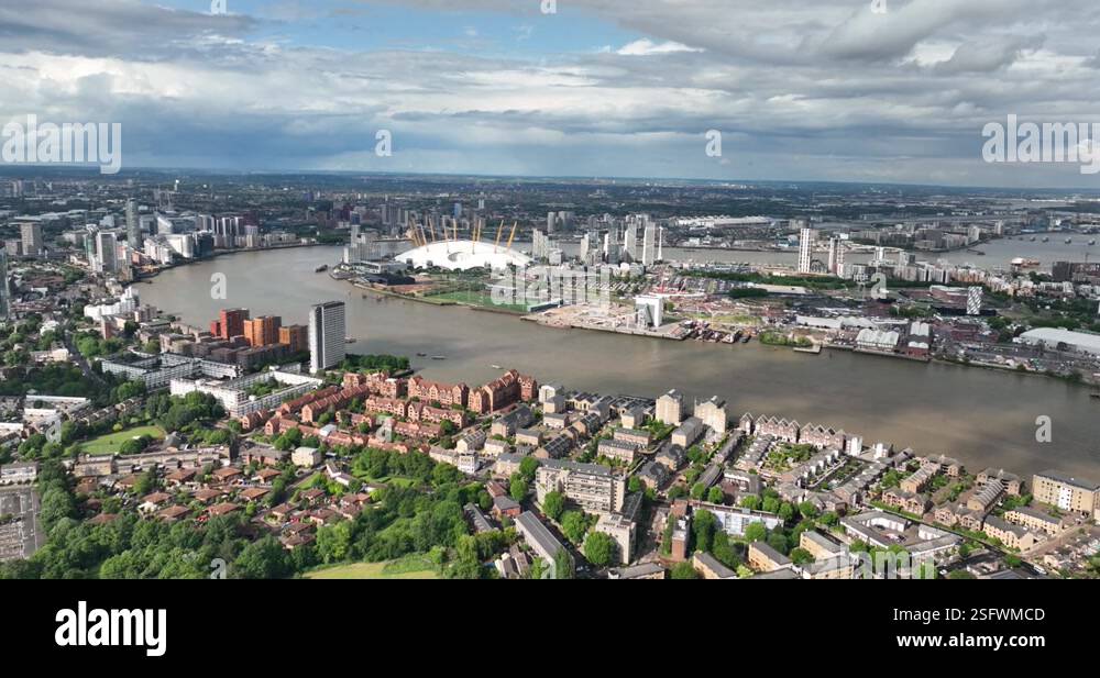 The O2 arena concert hall and residential houses across Thames river ...