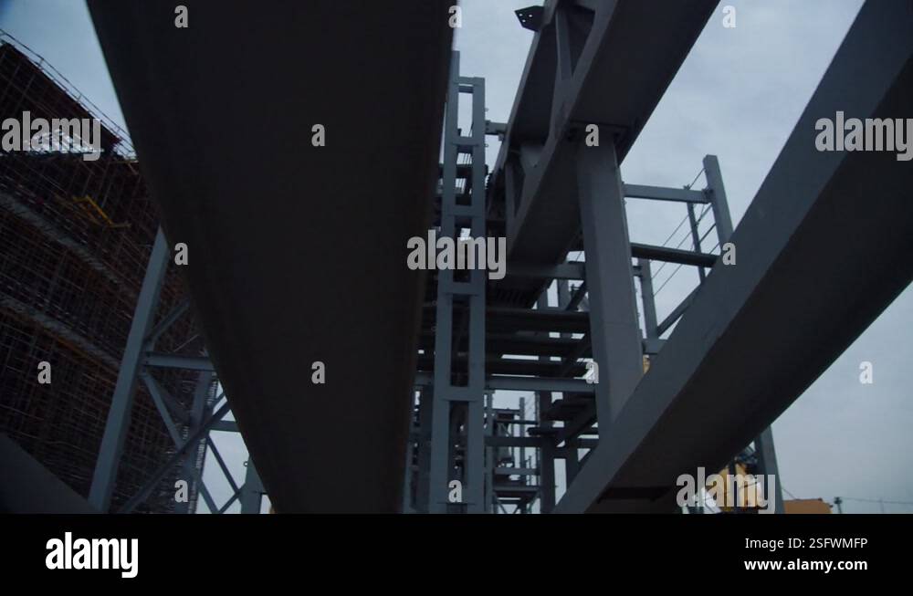 Parts of carcass made of beams at stadium construction site Stock Video ...