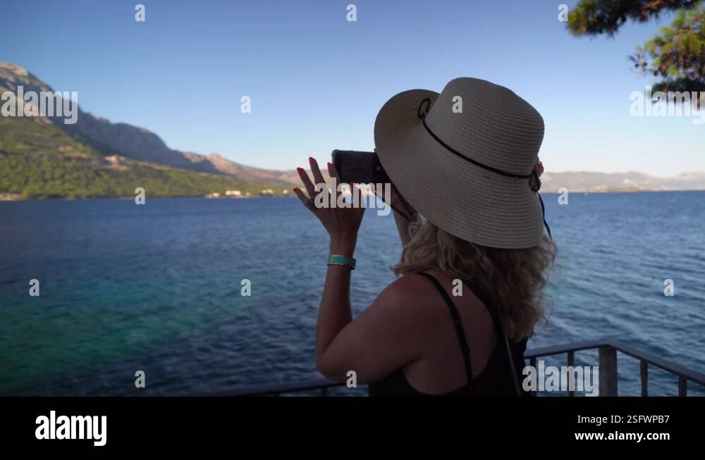 Female tourist taking photos majestic Stock Videos & Footage - HD and ...