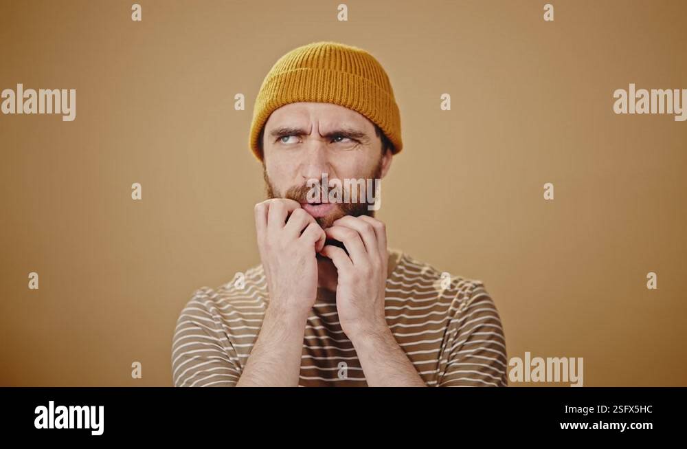 Middle-aged man looks scared thinking about bad things Stock Video ...