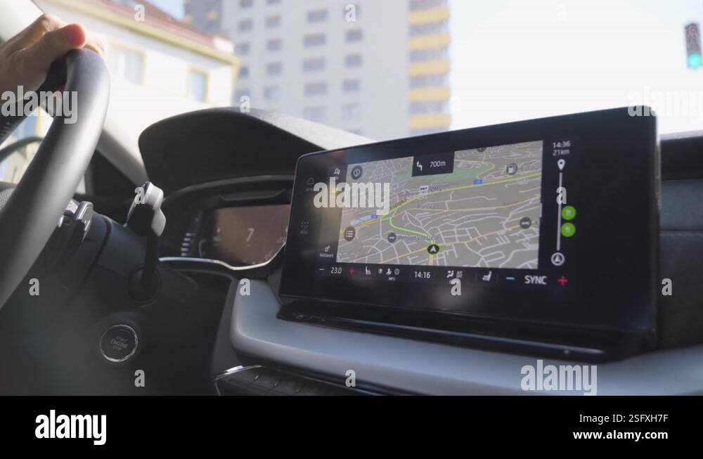 A map and GPS on the touchscreen system on the dashboard as the car ...