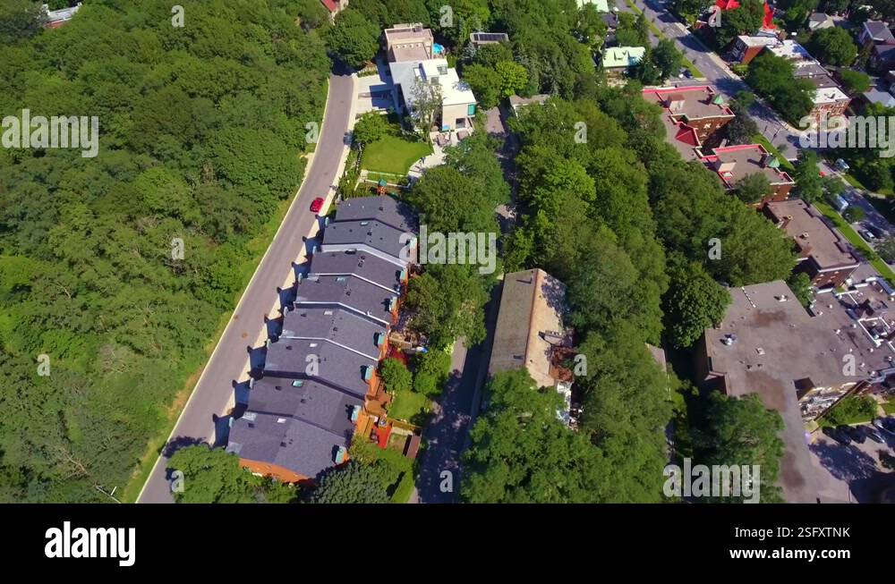 Rising aerial establishing shot tilting up to reveal the beautiful city ...
