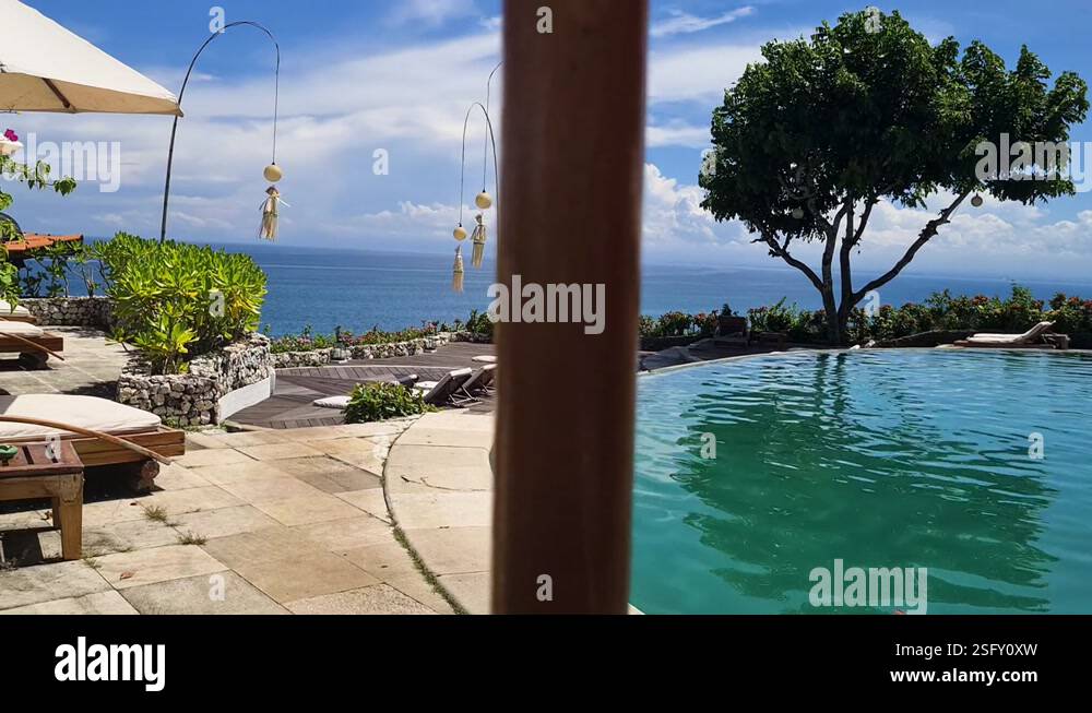 Bali, Indonesia, Swimming Pool, Sunbeds, Hindu Bamboo Poles With ...