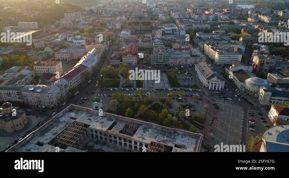 Aerial view Kyiv cityscape at sunset. Drone shot contract area at ...