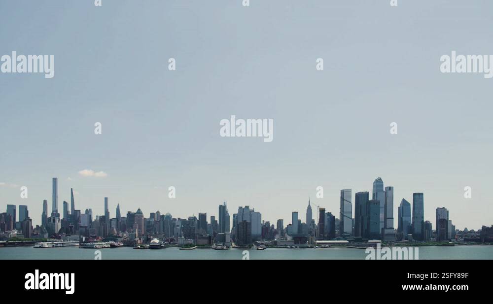 Midtown Manhattan Skyscrapers At Bottom Of Frame With Empty Blue Sky ...