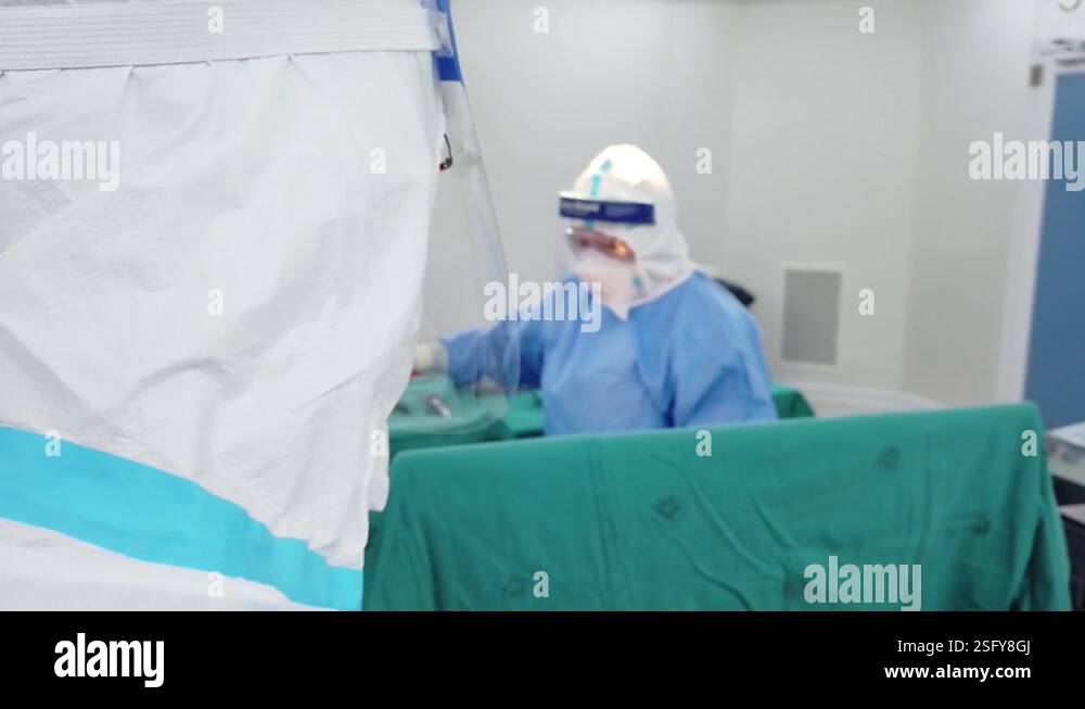 Asian Surgeon Wear PPE Perform Upper Body Surgery For Contagious ...