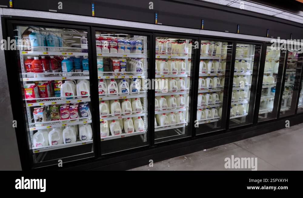 Walmart Retail grocery store interior Milk section pan Stock Video ...