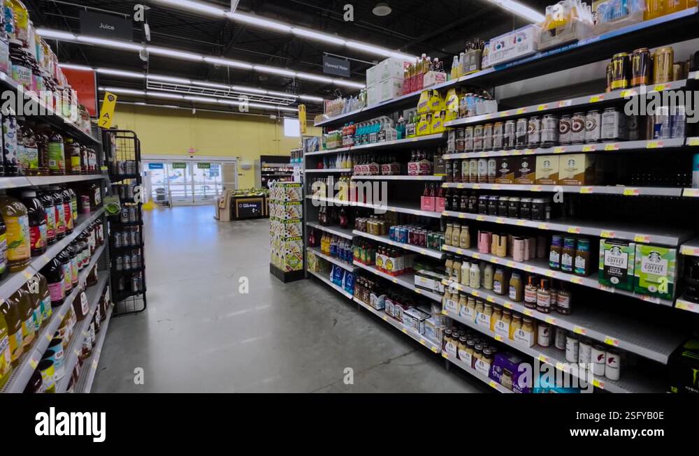Walmart Retail grocery store interior drink aisle front of store entrance Stock Video Footage ...