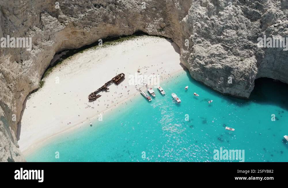 Tourists At Navagio Beach With Remains Of MV Panagiotis Shipwreck In ...