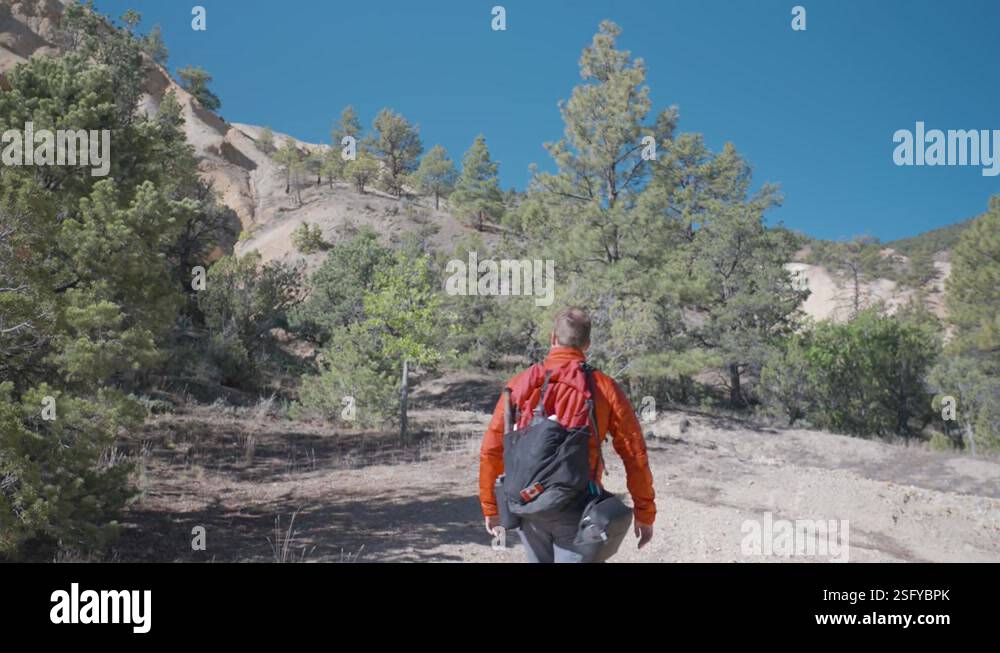 Hiker in Red Jack Hiking with Utah Desert Sulfur Mountains | Big Rock ...