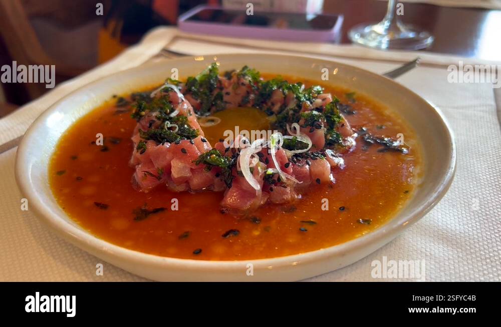 Delicious tuna tartare with seaweed and onion in Spain, tapas starter ...