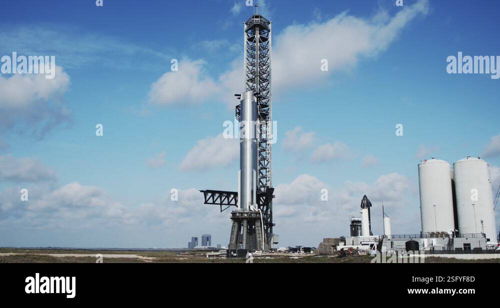 A SpaceX Starship launch vehicle and integration tower at the test ...
